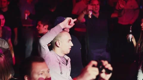 Young happy boy dance in crowded nightcl... | Stock Video | Pond5