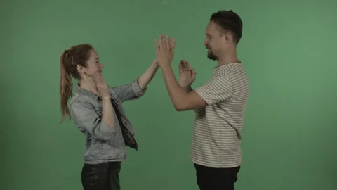 Young heterosexual couple playing clappi... | Stock Video | Pond5