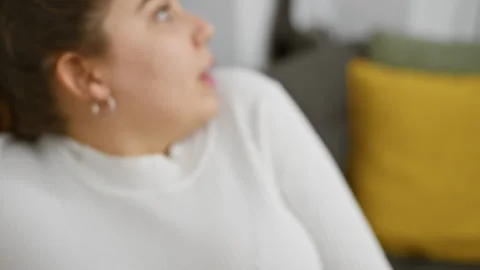 Young hispanic woman vaping indoors, giv... | Stock Video | Pond5