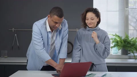 Young husband typing on laptop keyboard ... | Stock Video | Pond5