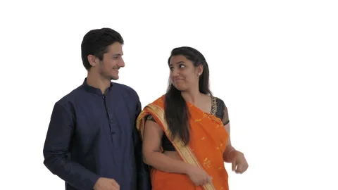 Young Indian couple pointing to the righ... | Stock Video | Pond5