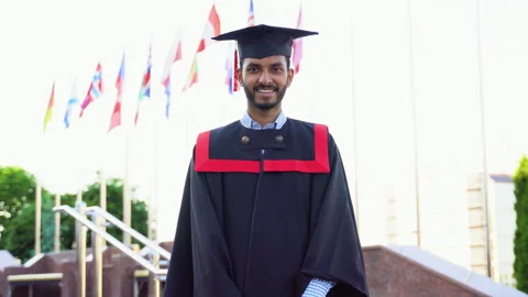 Young indian graduated holding graduatio... | Stock Video | Pond5