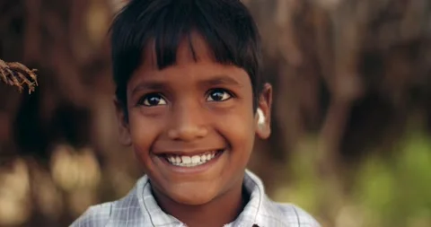 Young indian kid wearing a mask in the f... | Stock Video | Pond5