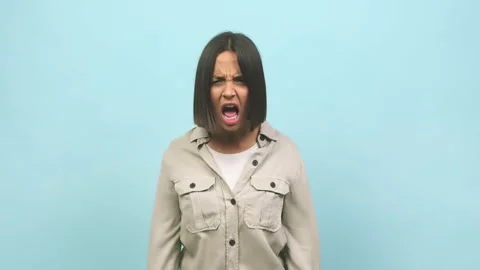 Young indian woman screaming angry, expr... | Stock Video | Pond5