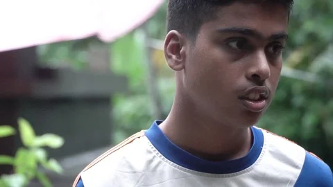 young kid looking desperately into camer... | Stock Video | Pond5