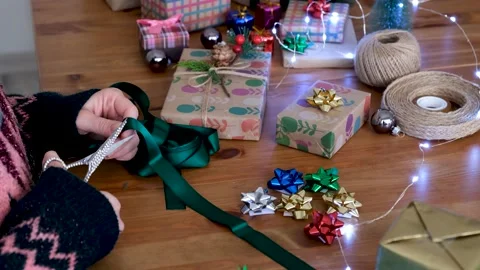 Young lady cutting green ribbon with fan... | Stock Video | Pond5