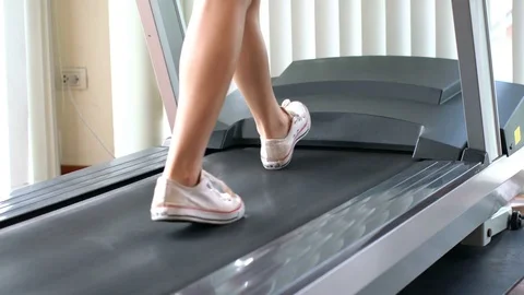 Young lady leg Walking on treadmill in f... | Stock Video | Pond5