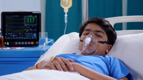 A young male patient is breathing throug... | Stock Video | Pond5