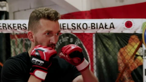 Young male practicing MMA fighting on a ... | Stock Video | Pond5