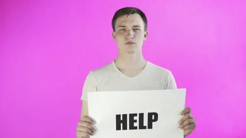 Young Man Activist With HELP Poster on p... | Stock Video | Pond5