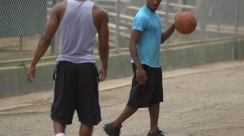A young man basketball player dunking wh... | Stock Video | Pond5