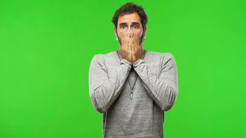 young man on chroma green screen very sc... | Stock Video | Pond5