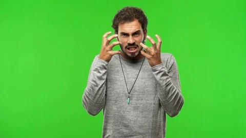young man on chroma green screen angry a... | Stock Video | Pond5
