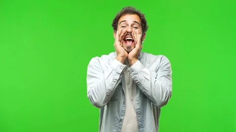 young man on chroma green screen shoutin... | Stock Video | Pond5