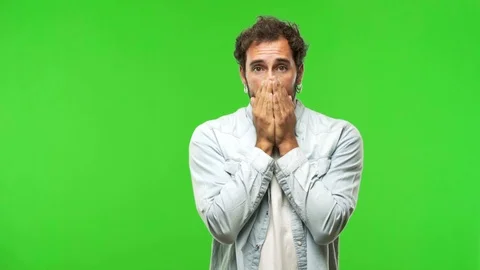 young man on chroma green screen very sc... | Stock Video | Pond5