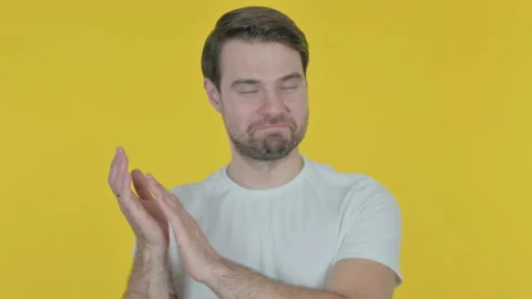 Young Man Clapping, Applauding on Yellow... | Stock Video | Pond5