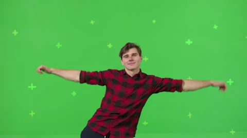young man dancing on green screen backgr... | Stock Video | Pond5