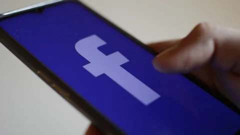 young man with facebook social network a... | Stock Video | Pond5