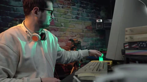 Young Man in Front of Desktop Computer T... | Stock Video | Pond5