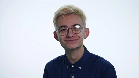 young man holding signs 'danger' on a wh... | Stock Video | Pond5