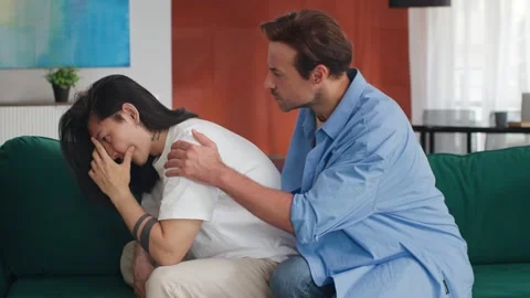 Young man hug and comfort upset gay part... | Stock Video | Pond5