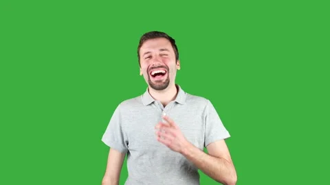 Young man laughing, green screen backgro... | Stock Video | Pond5