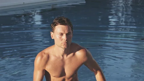 Young Man Leaving Swimming Pool | Stock Video | Pond5