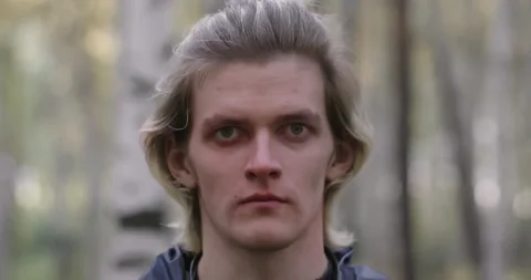 Young man with look of maniac. Stock. Yo... | Stock Video | Pond5