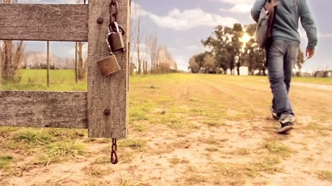 Young Man Opening Gate While Leaving his... | Stock Video | Pond5