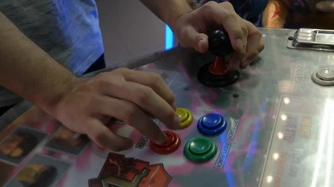 Young Man Playing Arcade Game | Stock Video | Pond5