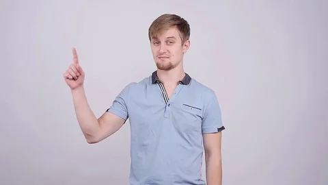 A young man pointing to an excellent ide... | Stock Video | Pond5