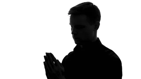 Young man shadow praying, asking forgive... | Stock Video | Pond5