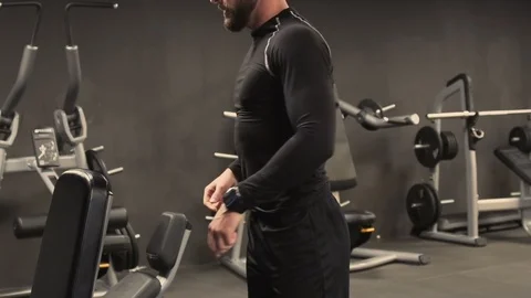 Young man stretching back muscles after ... | Stock Video | Pond5