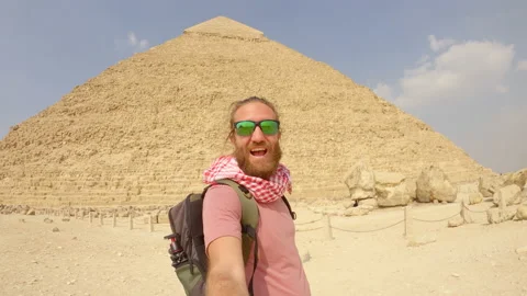 Young man takes cool selfies at the Grea... | Stock Video | Pond5