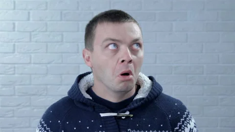 Young man very scared and afraid, desper... | Stock Video | Pond5