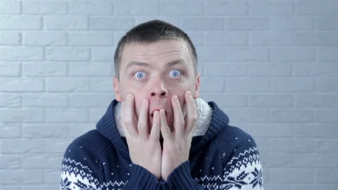 Young man very scared and afraid, desper... | Stock Video | Pond5