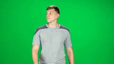 Young man walking on a Green Screen, Chr... | Stock Video | Pond5