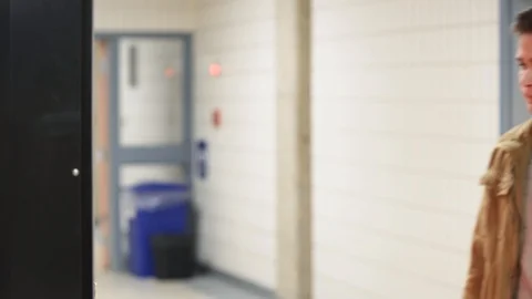 A young man walking up to a vending mach... | Stock Video | Pond5