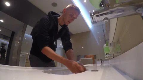 Young Man Washing Hands in Sink after Pe... | Stock Video | Pond5