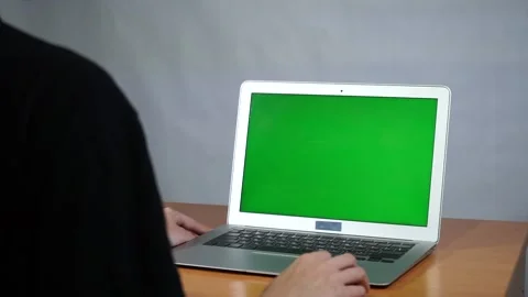 A young man working on a green screen co... | Stock Video | Pond5