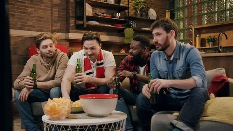 Young men chilling out at home and activ... | Stock Video | Pond5