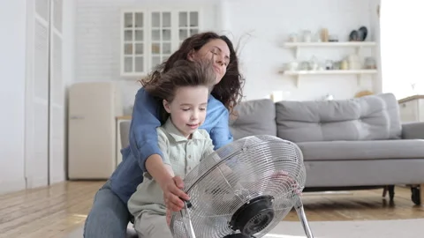Young mom and son have fun enjoy cooling... | Stock Video | Pond5
