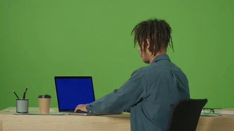 Young Multicultural Typing on Blue Scree... | Stock Video | Pond5