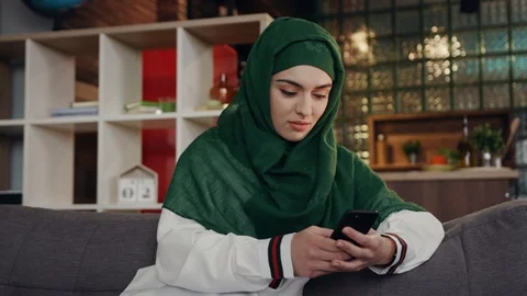 Hijab Use Phone Stock Footage ~ Royalty Free Stock Videos | Pond5