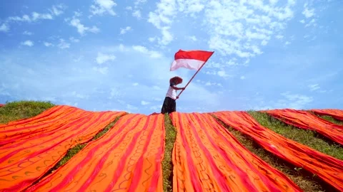 Young people flapper Indonesian flag | Stock Video | Pond5