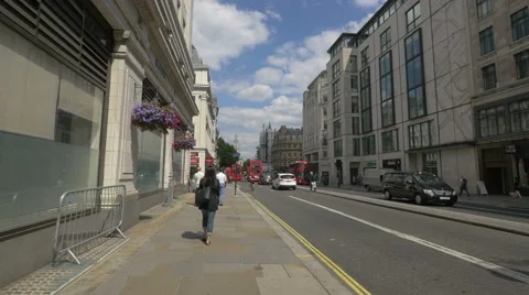 Young people walking on Strand Street in... | Stock Video | Pond5