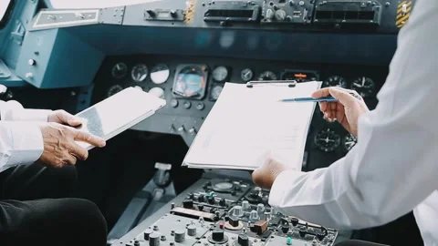Young pilot man in uniform talking with ... | Stock Video | Pond5