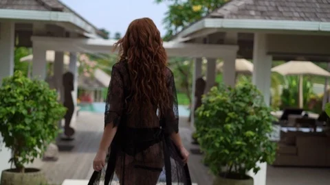 Young sexy red-hair woman in black linge... | Stock Video | Pond5