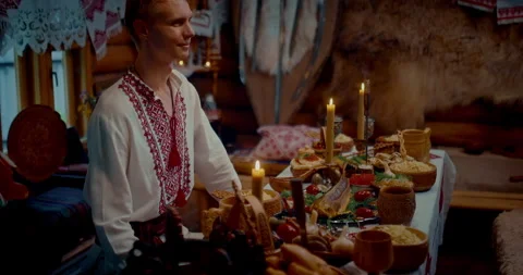 young Slavic man sitting at table with d... | Stock Video | Pond5