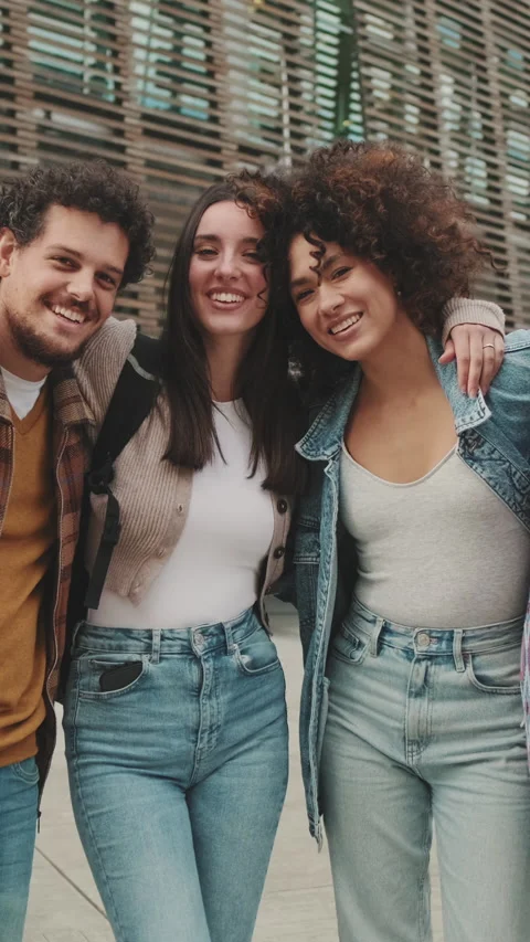 Young smiling people posing while standi... | Stock Video | Pond5